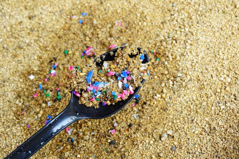 Microplastic Pollution on the Beach Sand Stock Photo - Image of ...