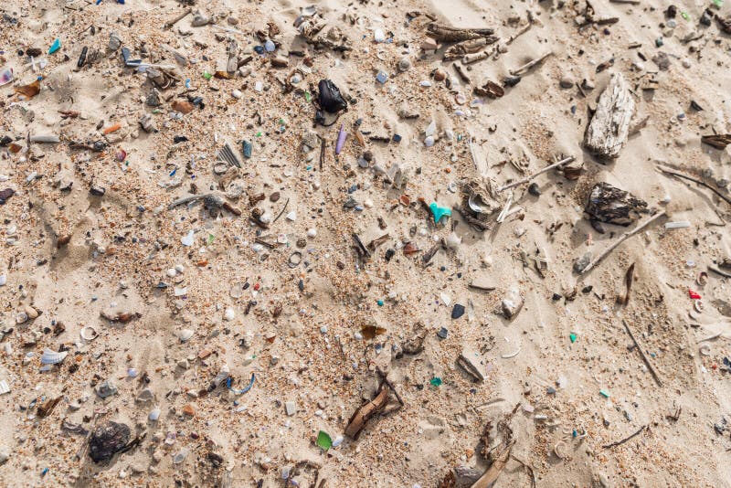Microplastic Rubbish on Coastline. Plastic Garbage in Sand on Ocean ...