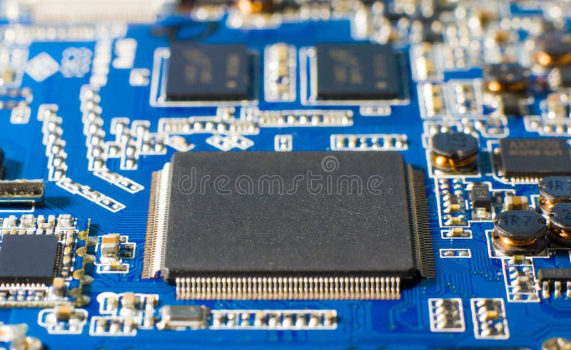 Microprocessor on Blue Circuit Board. Close-up of a Computer Microchip ...
