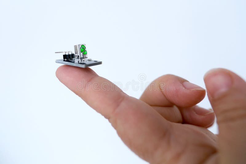 Tiny Microchip Finger Stock Photos - Free & Royalty-Free Stock Photos ...