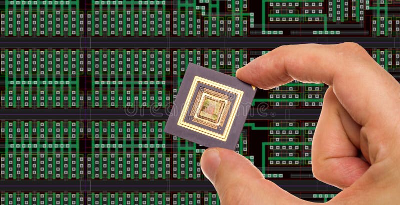 Microprocessor in Hand Over Its Layout Stock Photo - Image of contact ...