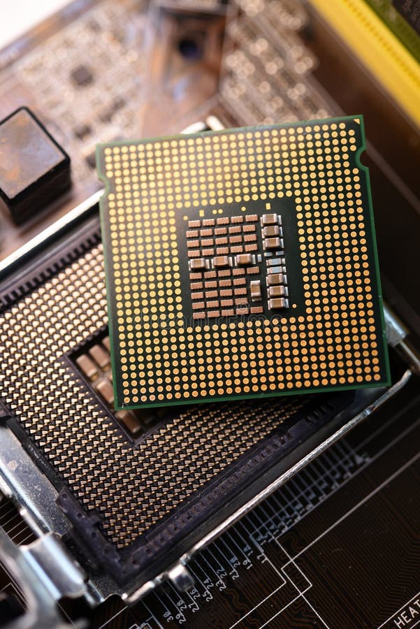 Microprocessor and Socket on the Motherboard. Computer Radio Components ...