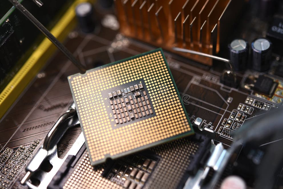 Microprocessor and Socket on the Motherboard. Computer Radio Components ...