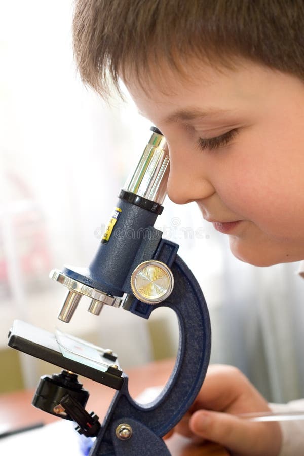 Baby with microscope. stock photo. Image of chemical, childhood - 4125630
