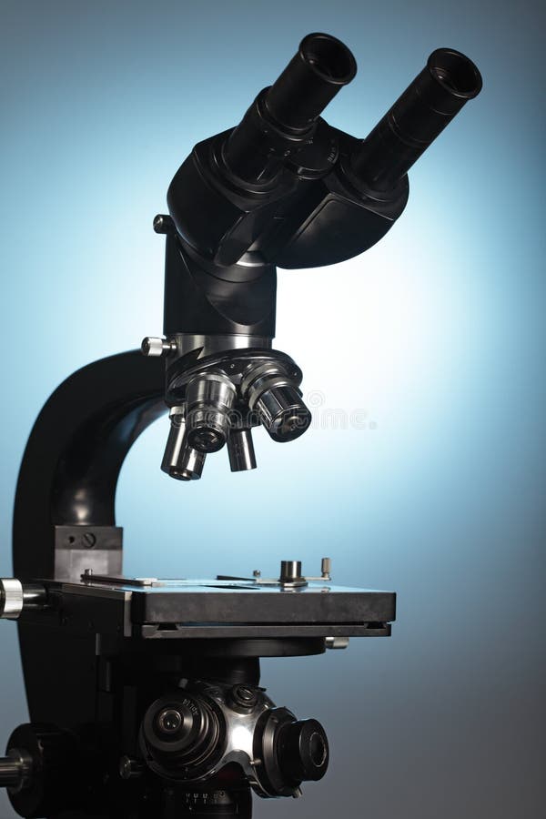 Microscope On Blue Background Stock Photography - Image: 16663342