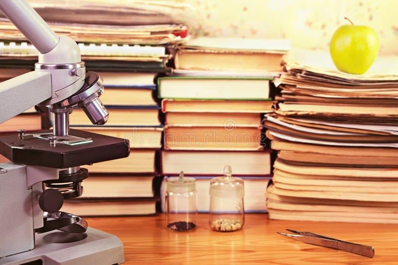 Microscope and Books in Scientific Study Stock Photo - Image of ...