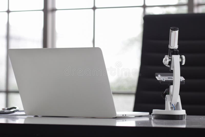 Microscope and Computer at Working Room. Science Concept. Stock Photo ...