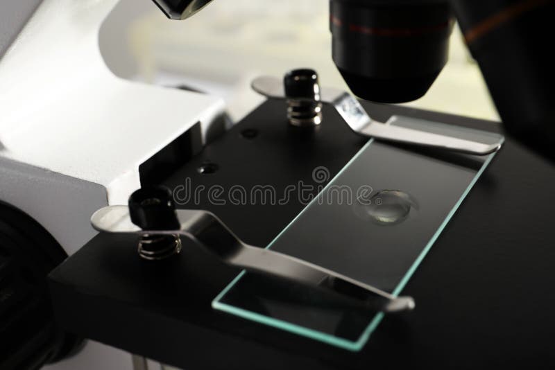 Microscope with Drop of Urine on Glass Slide, Closeup Stock Photo ...