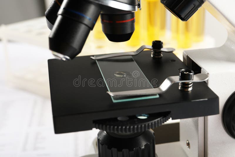 Microscope with Drop of Urine on Glass Slide in Laboratory, Closeup ...