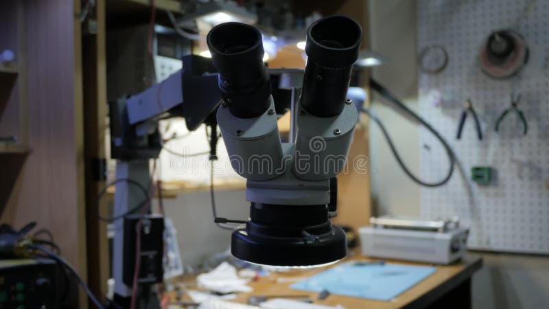 Microscope in Electronics Repair Shop Stock Footage - Video of people ...