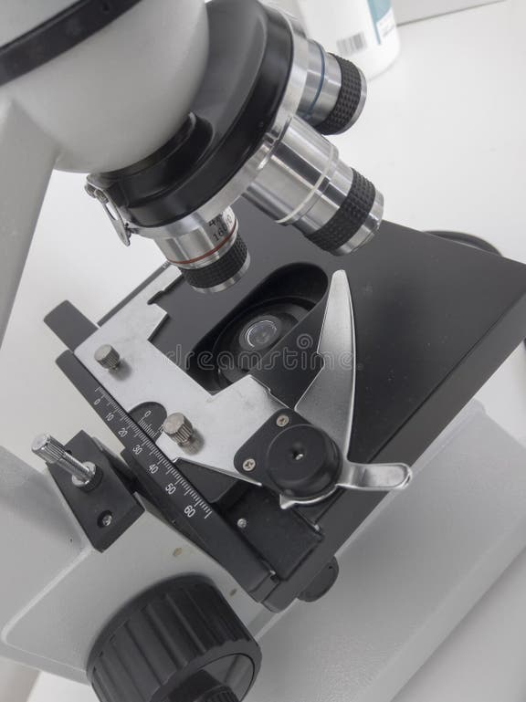 Microscope, Examining Samples and Liquid. Technical Equipment Stock ...