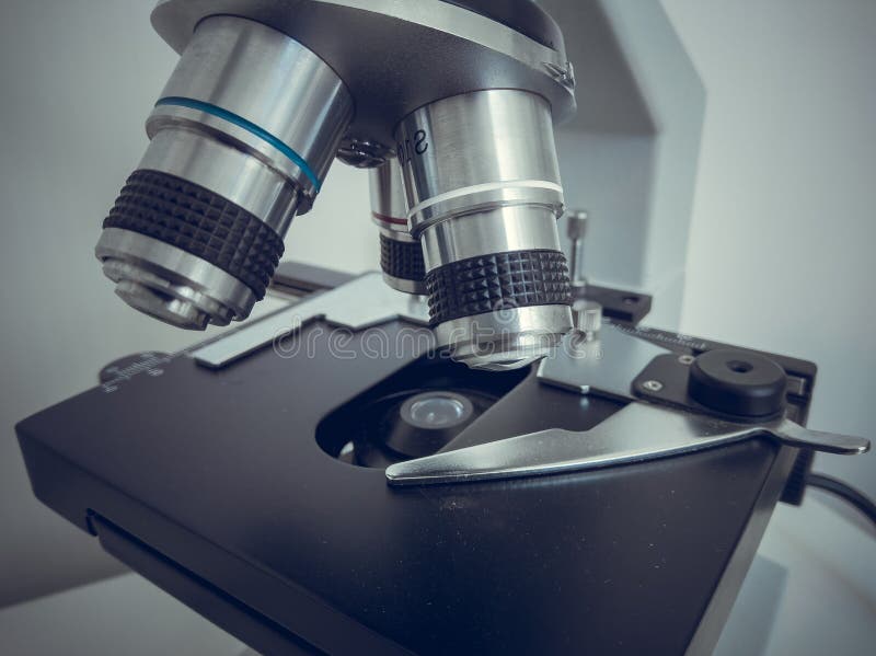 Microscope, Examining Samples and Liquid. Technical Equipment Stock ...