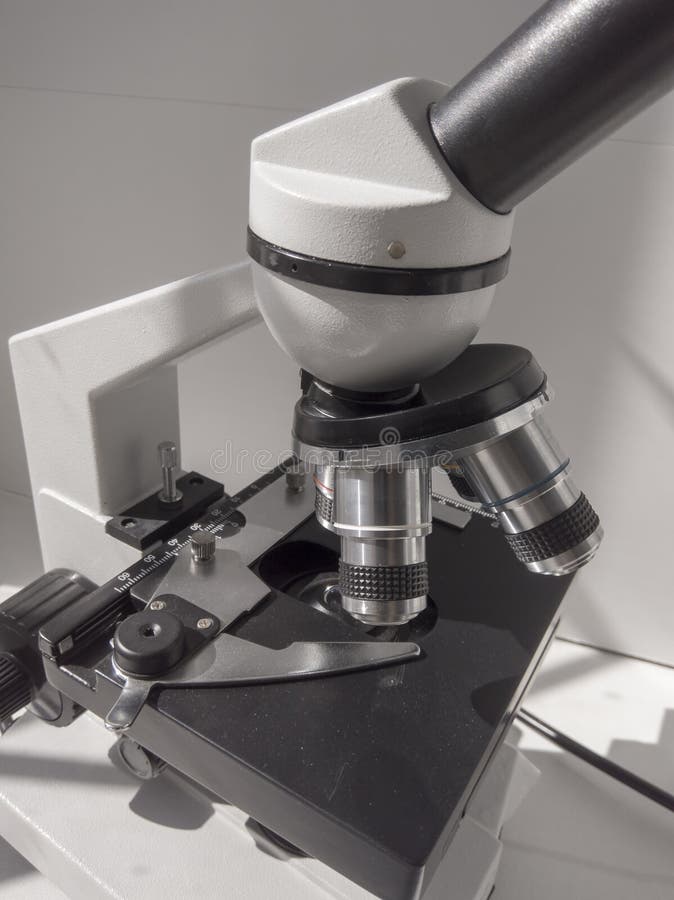 Microscope, Examining Samples and Liquid. Technical Equipment Stock ...