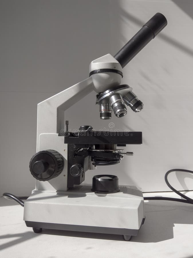 Microscope, Examining Samples and Liquid. Technical Equipment Stock ...