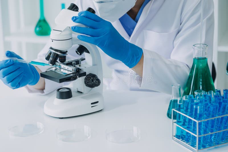 Microscope with Lab Glassware, Science Laboratory Research and ...