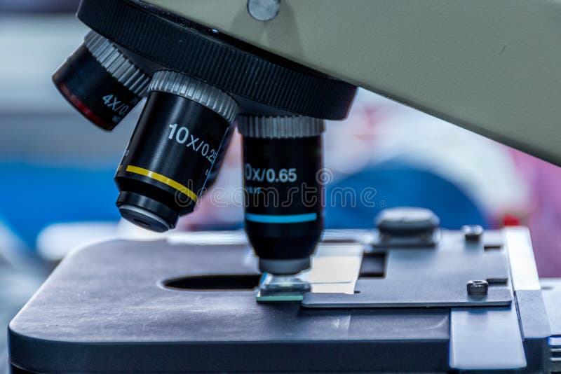 Microscope in laboratory stock image. Image of explore - 93359511