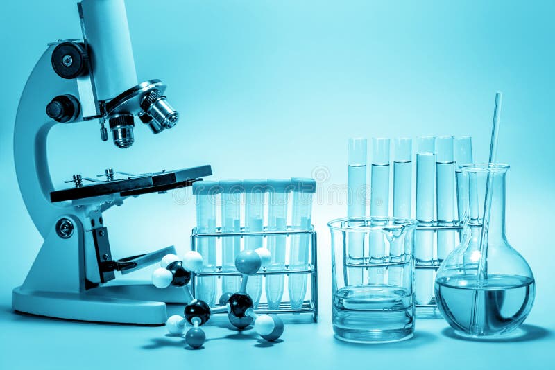 Microscope and Laboratory Test Tube on Light Blue Background , S Stock ...