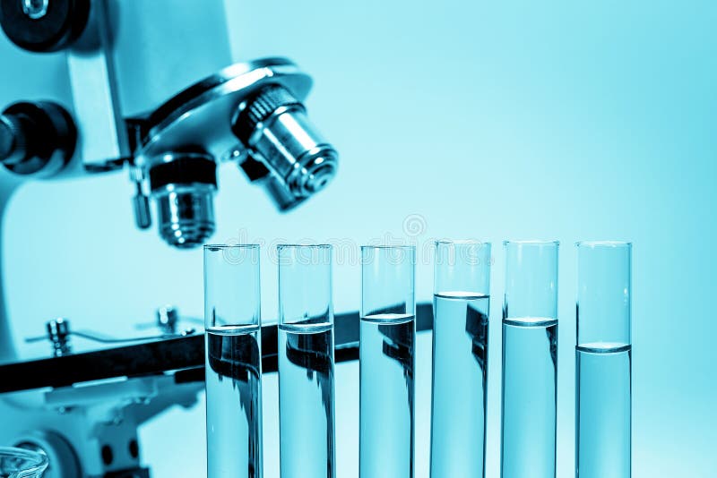 Microscope and Laboratory Test Tube on Light Blue Background , S Stock ...
