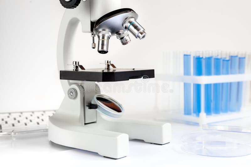 Microscope in the Laboratory with Test Tubes Stock Image - Image of ...