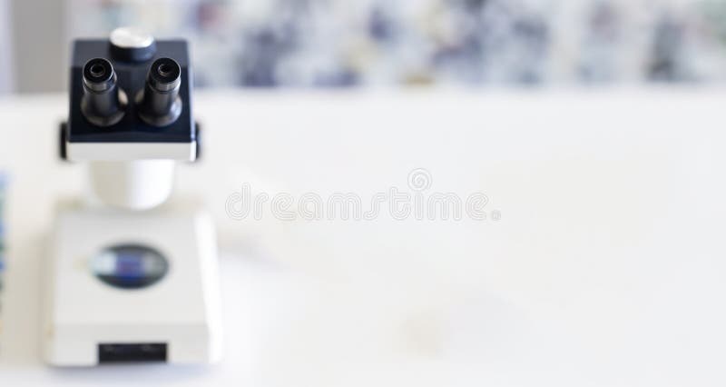 Microscope in a Laboratory - on a White Wall. Stock Image - Image of ...