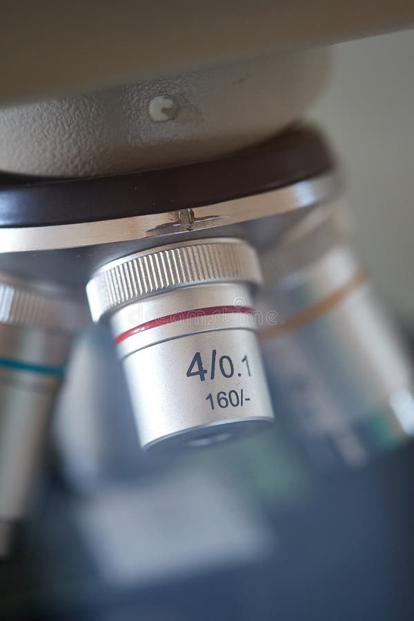 Microscope lens closeup stock image. Image of microscopy - 140926051