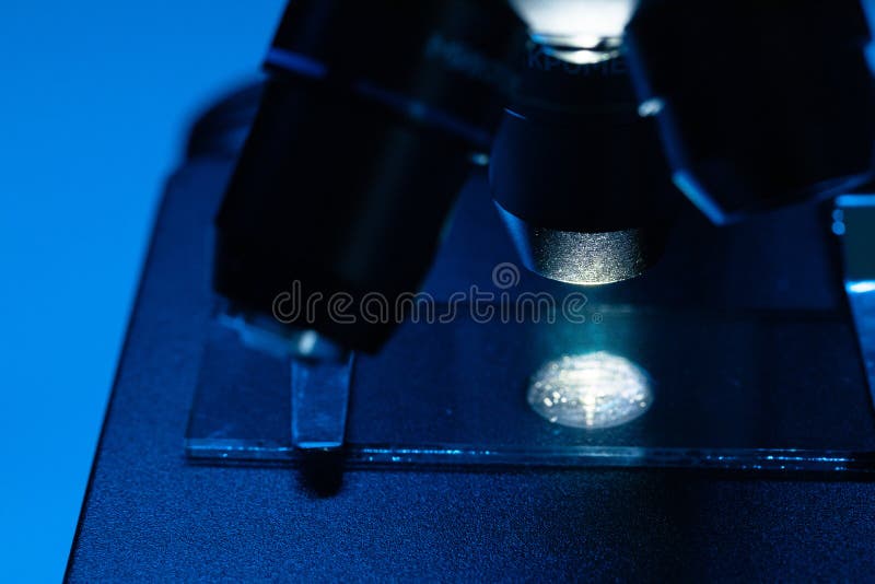 Microscope with Lenses Close Up Against Dark Background Stock Image ...