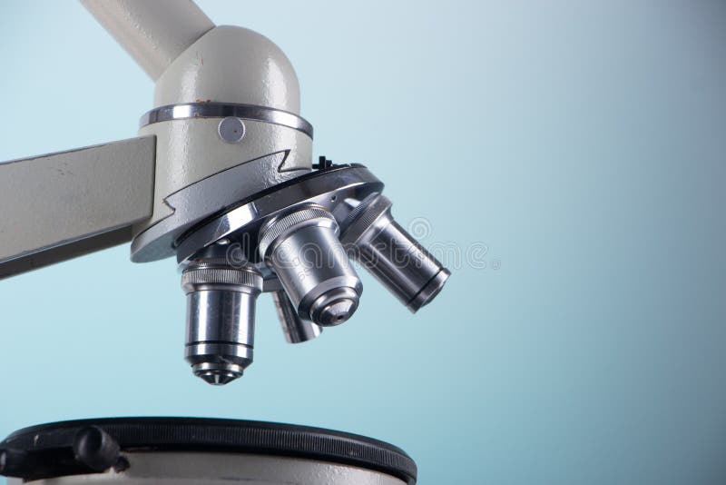 Microscope Lenses Close Up on Green Background Stock Image - Image of ...