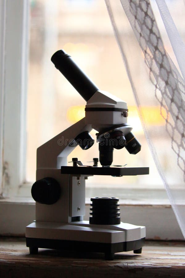 Microscope on an Old Windowsill Near the Window Stock Image - Image of ...