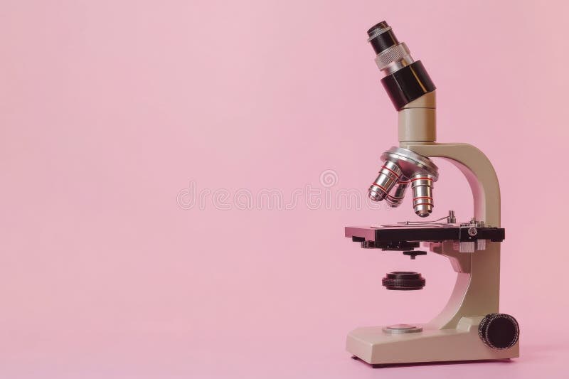 Microscope Placed on a Pink Background Showing an Educational Setup for ...