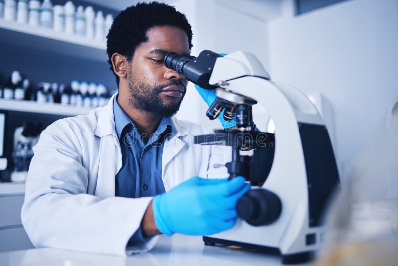 Microscope, Science Laboratory and Black Man Research Medical Analysis ... Microscope, Science Laboratory and Black Man Research Medical Analysis ...
