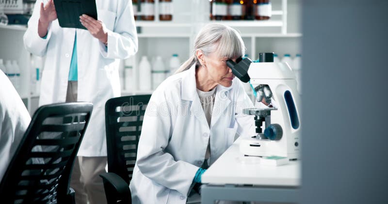 Microscope, Science and Tablet with Team in Laboratory for Breakthrough ...