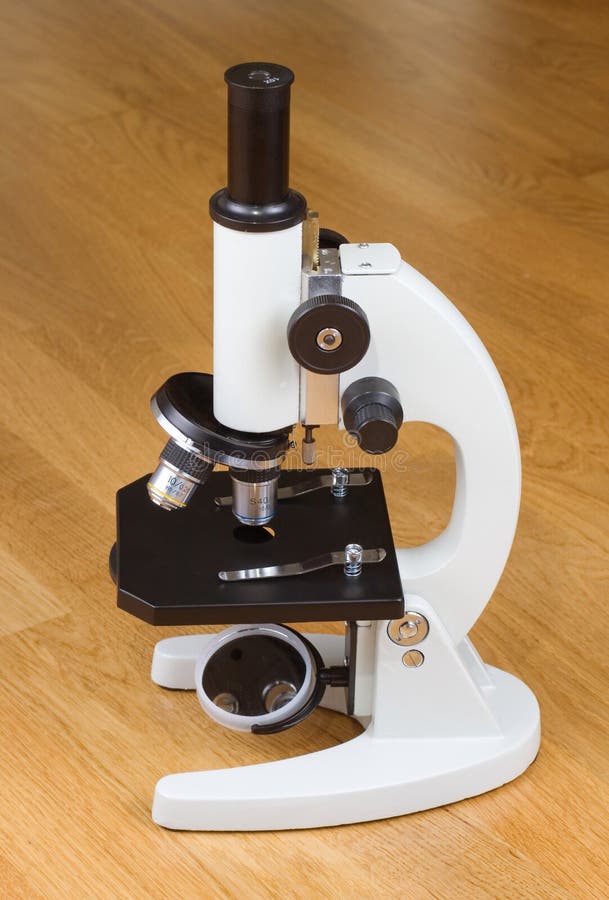 Microscope on a table stock image. Image of microscopy - 14631937