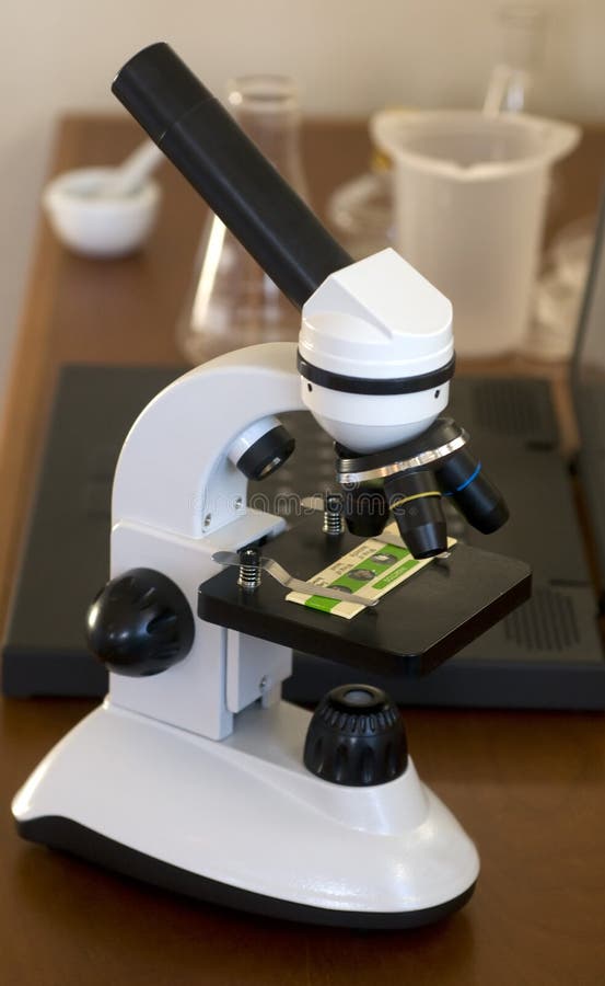 Microscope On Table With Laboratory Equipment In Chemical Lab With ...