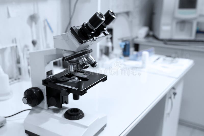 Microscope on Table in Laboratory. Research and Analysis Stock Image ...