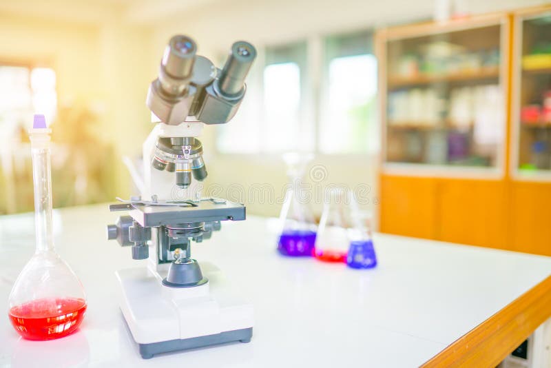 Microscope on the Table in Laboratory Room Stock Photo - Image of ...