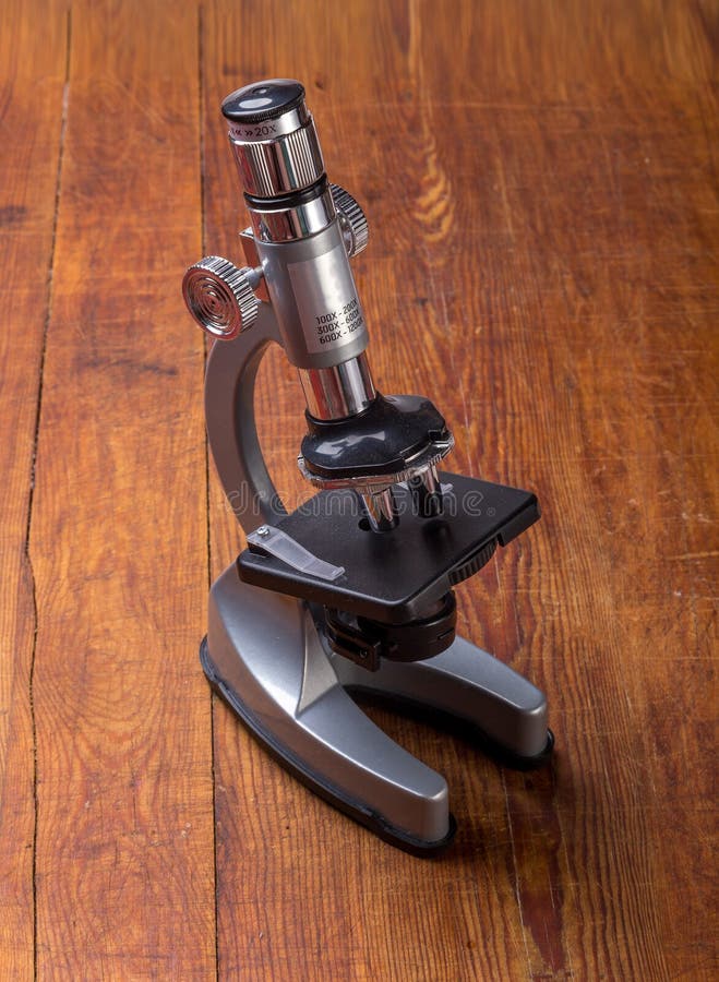 Microscope on table stock image. Image of magnify, investigation - 51834683