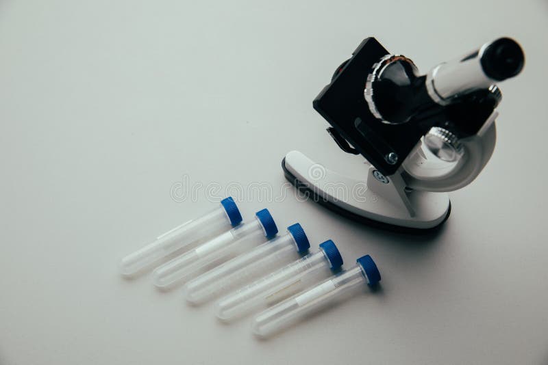 Microscope and Test Tube on a Table. Healthcare Concept Stock Photo ...