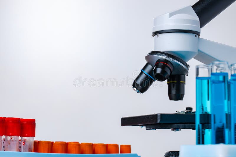 Microscope with Test Tubes for Research Close Up Stock Photo - Image of ...