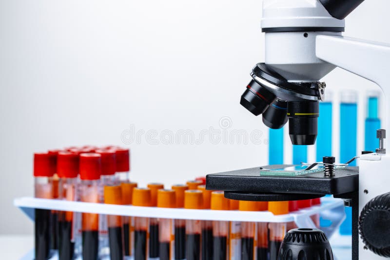 Microscope with Test Tubes for Research Close Up Stock Photo - Image of ...