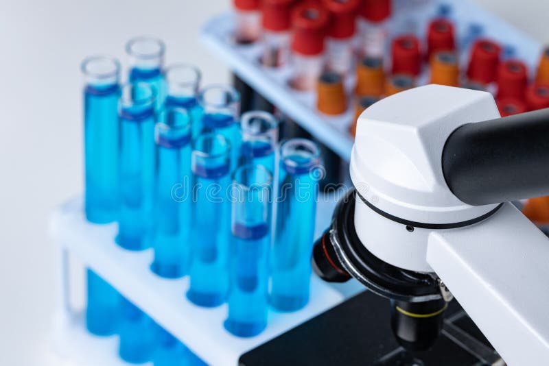 Microscope with Test Tubes for Research Close Up Stock Photo - Image of ...