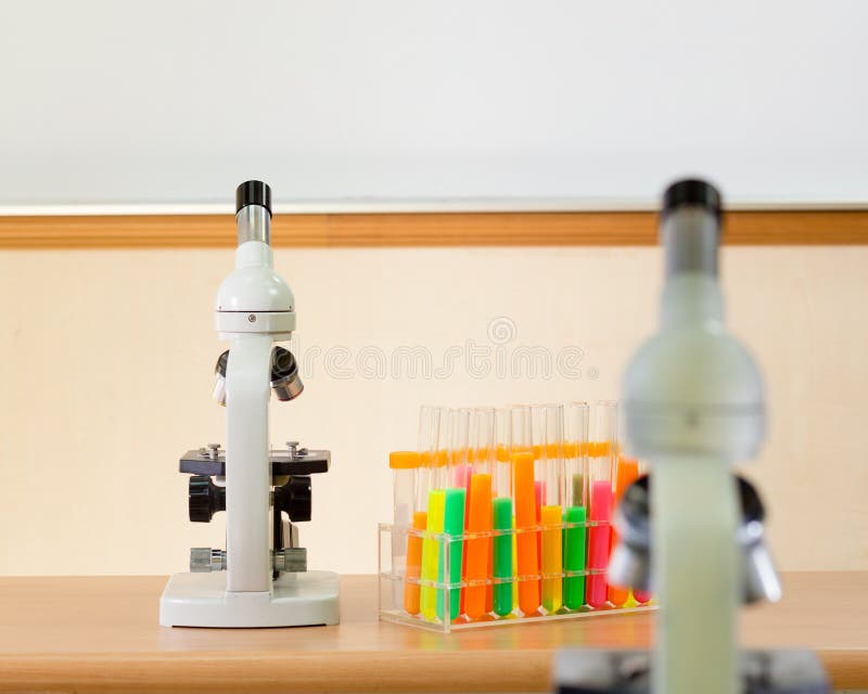 Microscope and Test Tubes in Science Lab Stock Image - Image of ...