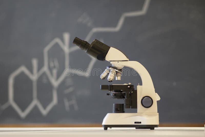 Microscope To Examine Cells with Chemical Formula in the Background ...