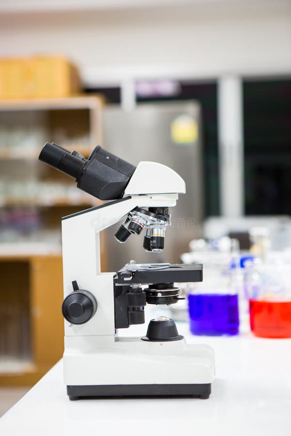 Microscopes in a lab stock image. Image of examination - 68632263