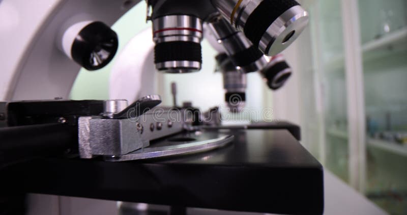 Microscopes Organized in Row at Workplace in Laboratory Stock Footage ...