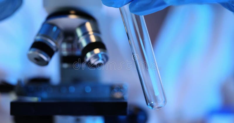 Microscopic Analysis of a Sample of a Substance in Test Tubes in ...