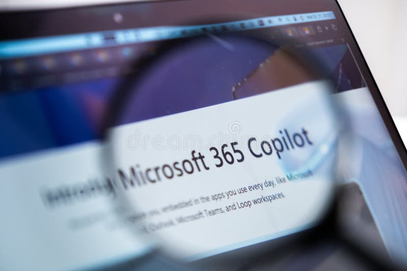 Microsoft 365 Copilot Logo on the Screen of Laptop through Magnifying ...