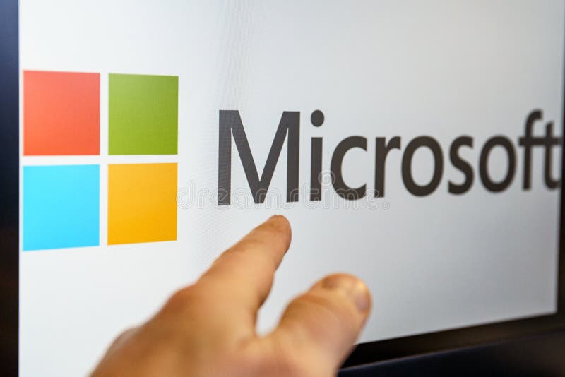 Microsoft Logo on Screen. Microsoft Corporation is an American ...