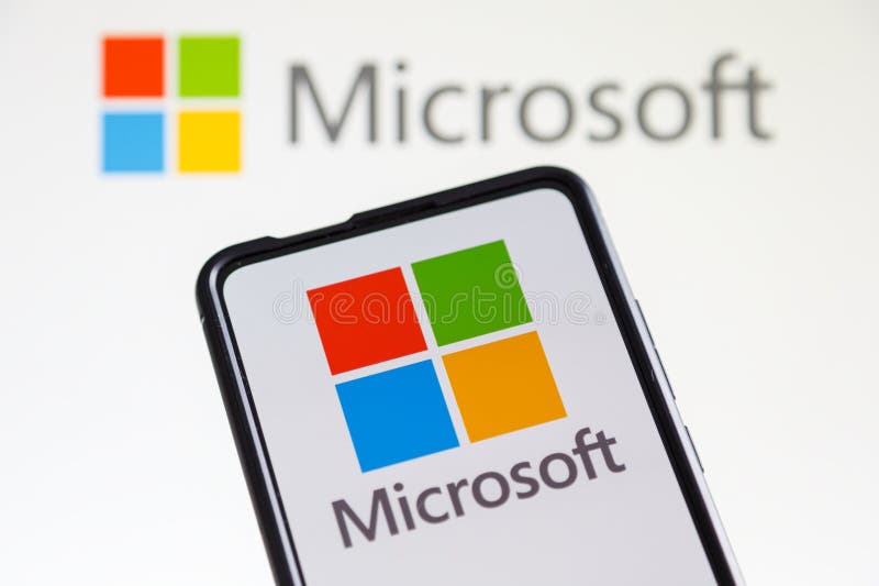 Microsoft Logo of the Software Company on a Mobile Phone and Computer ...