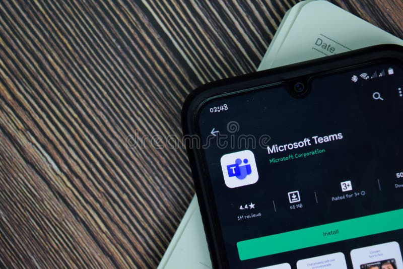 Microsoft Teams App with Magnifying on Smartphone Screen. Editorial ...