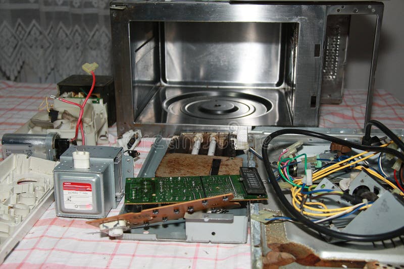 Microwave Oven Disassembled on a Kitchen Table Stock Image - Image of ...